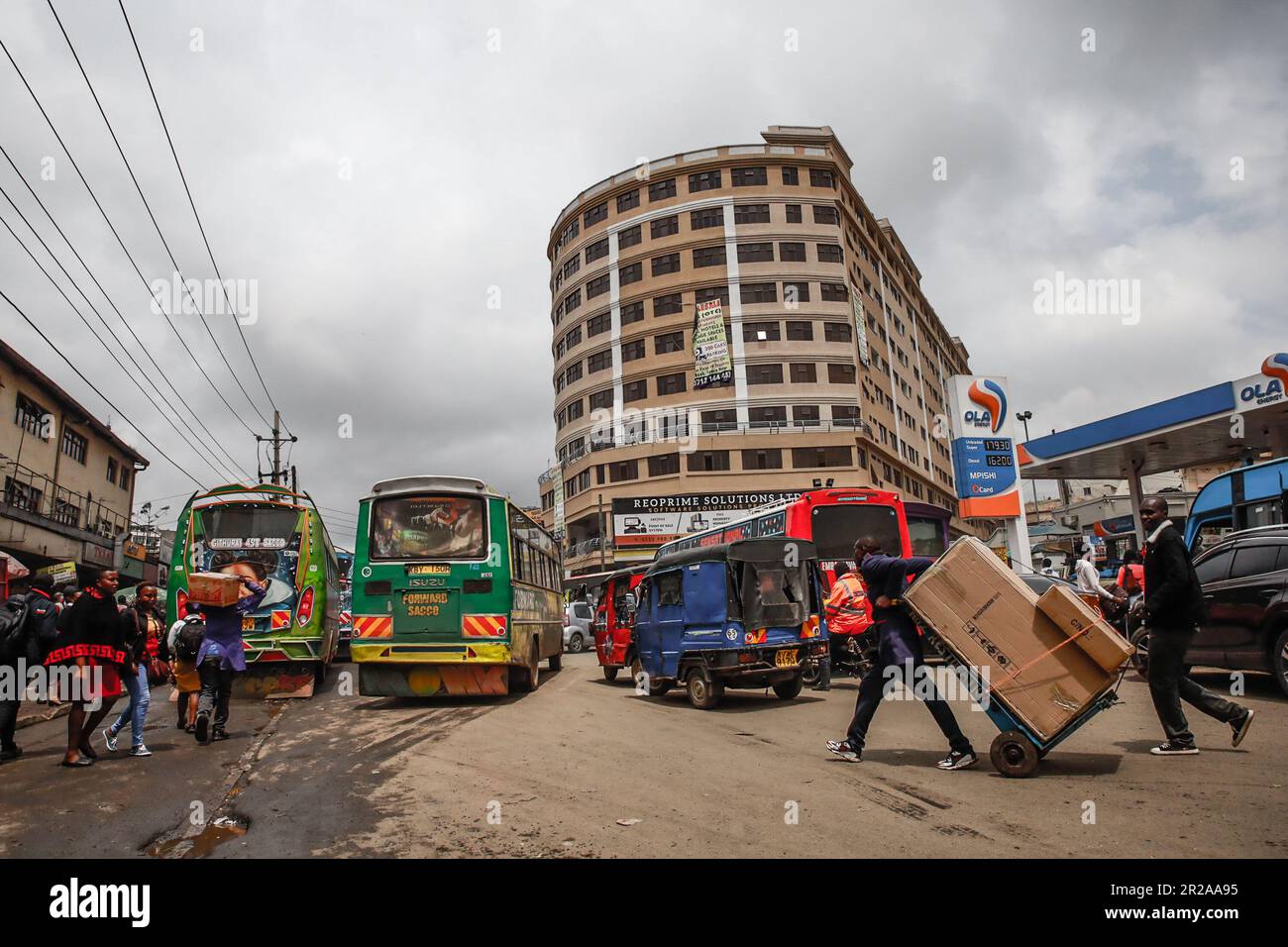 Nairobi, Kenya. 09th May, 2023. Nairobi residents and hawkers walk past ...