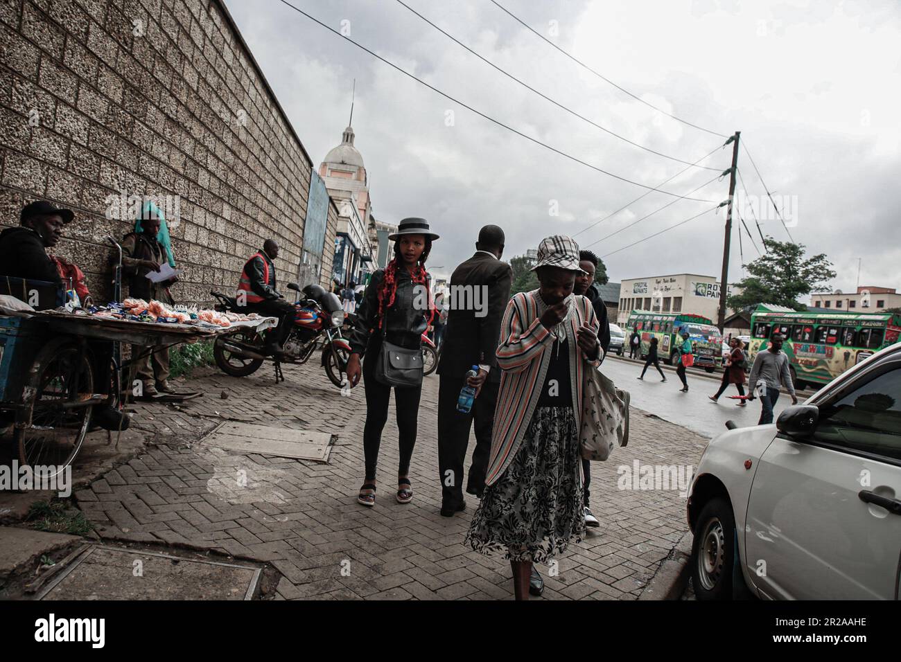 May 9, 2023, Nairobi, Kenya: Nairobi residents and hawkers walk past ...