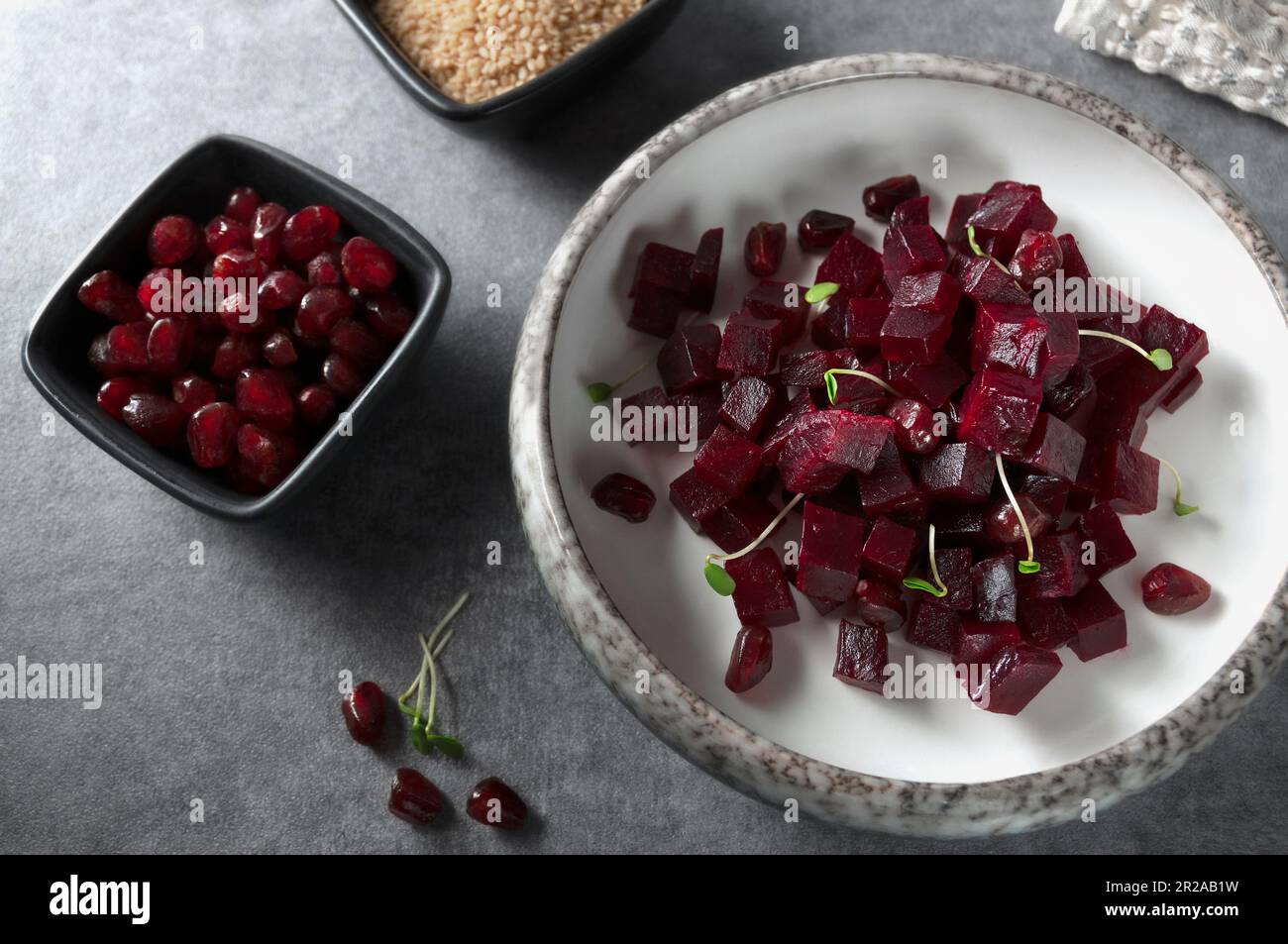 Fresh beetroot salad diced with pomegranate seeds, sesame seeds and ...