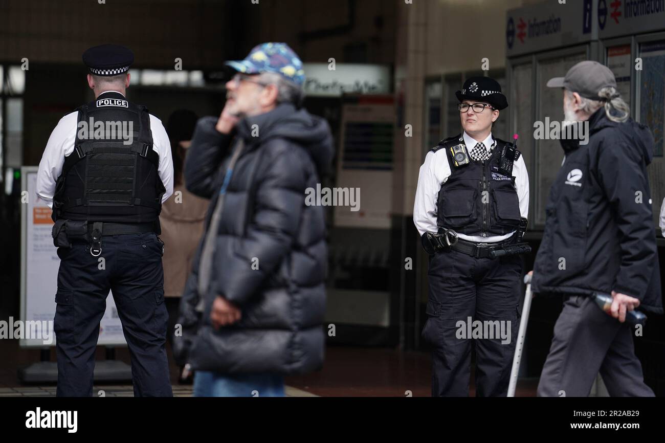 Police officers at West Croydon train station in South London ...