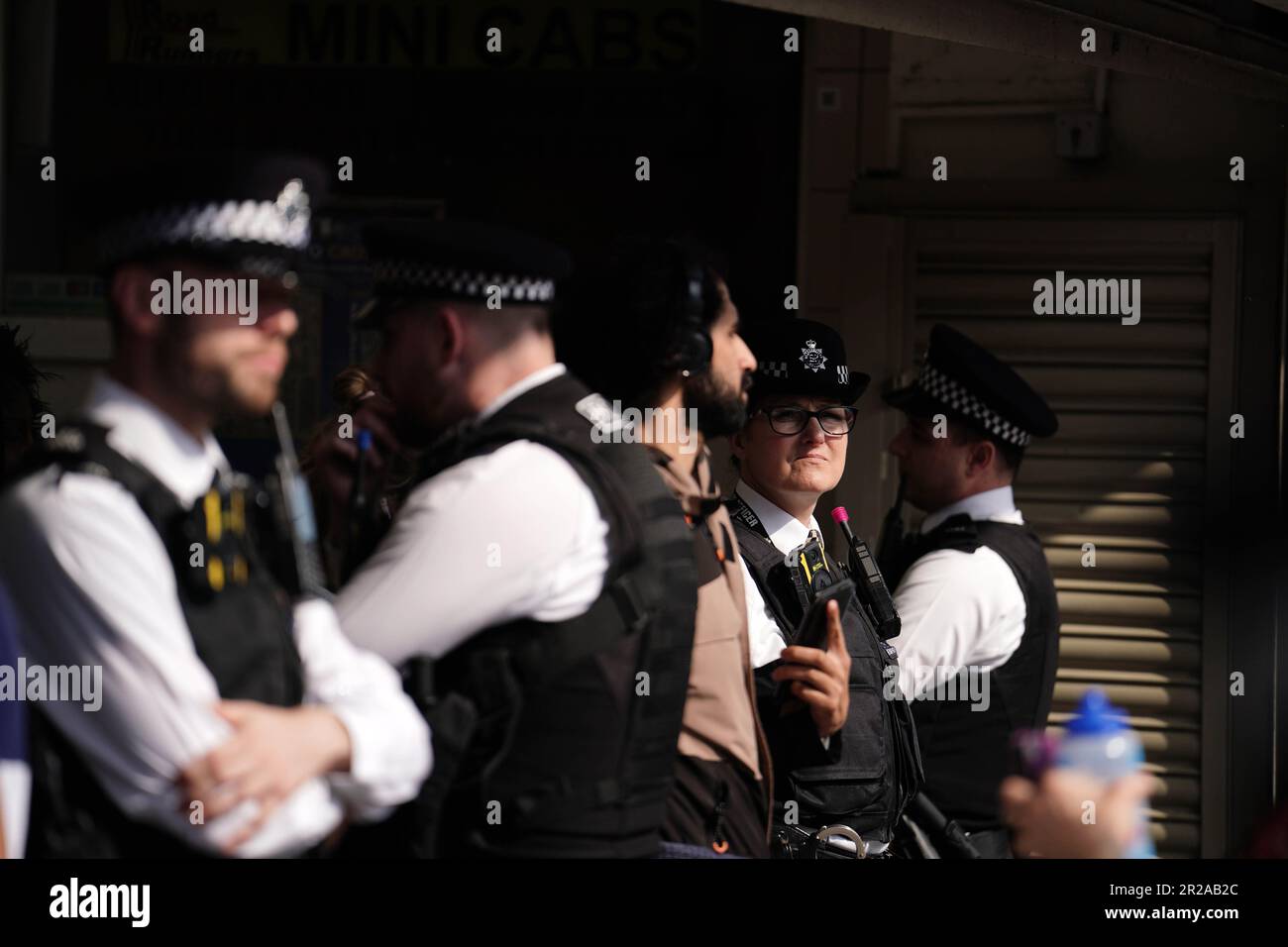 Police officers at West Croydon train station in South London ...