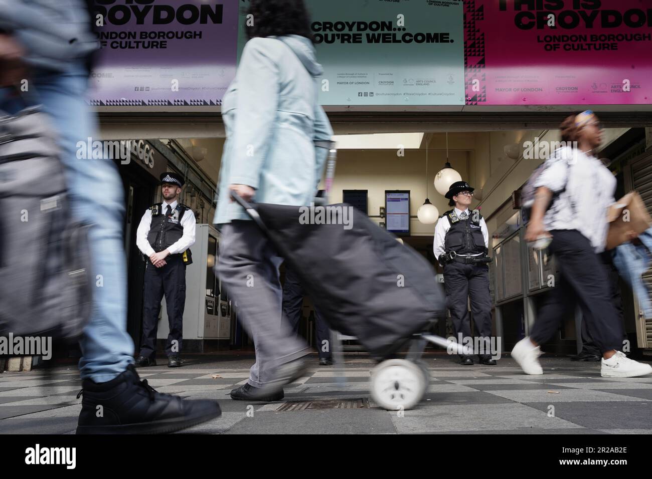 Police officers at West Croydon train station in South London ...