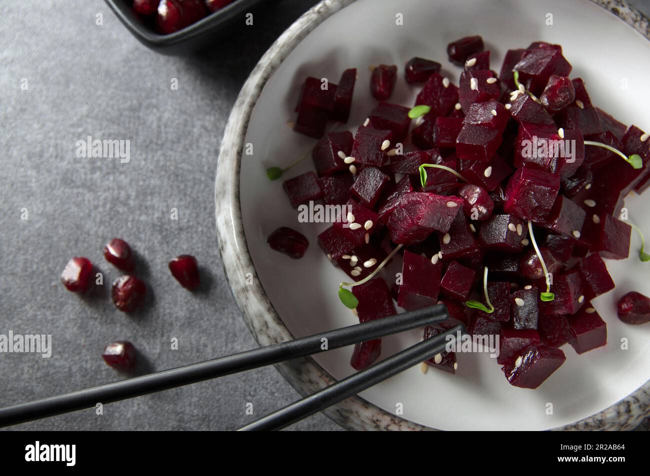 Fresh beetroot salad diced with pomegranate seeds, sesame seeds and ...