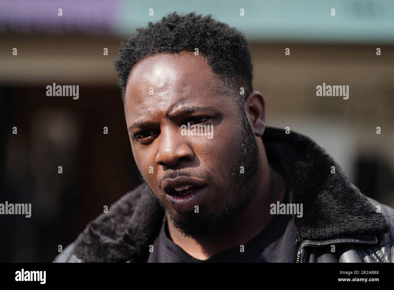 Knife crime campaigner Anthony King with Police officers at West Croydon train station in South ...