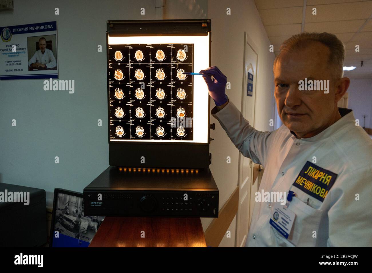 Dnipro, Ukraine. 14th May, 2023. Dr. Sergii Ryzhenko pointing to pieces ...