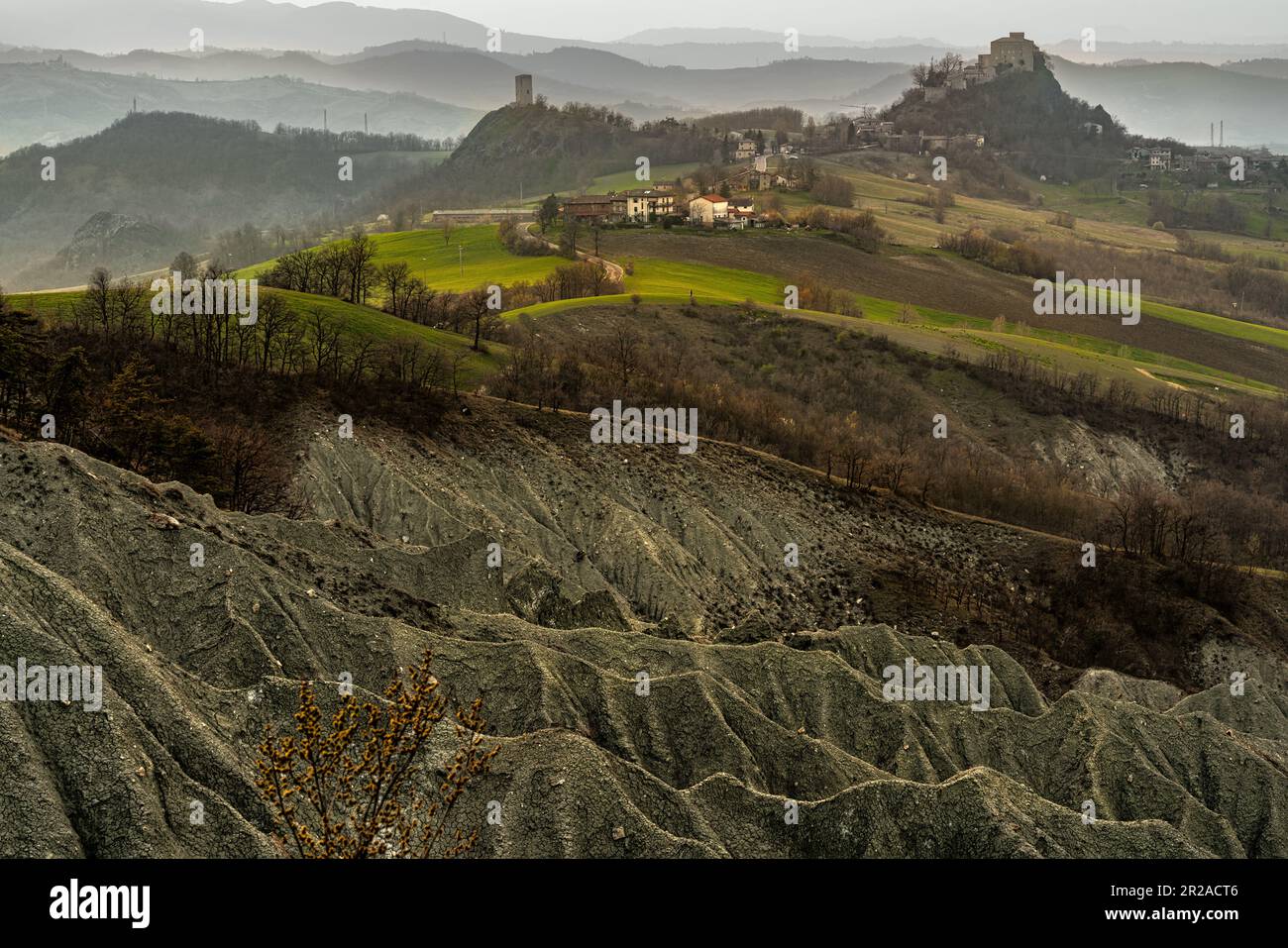 Sunset on the hills of the Terre di Canossa, on the gullies and on the ...