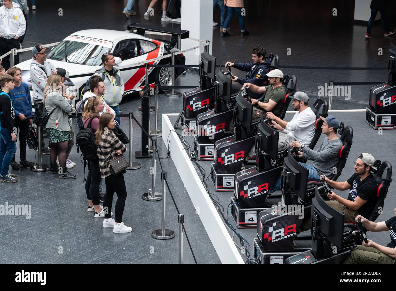 Friedrichshafen, Germany. 18th May, 2023. Visitors take part in a sim ...