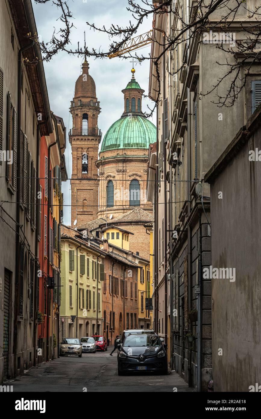 Glimpses of the historic center of Reggio Emilia in the background the ...