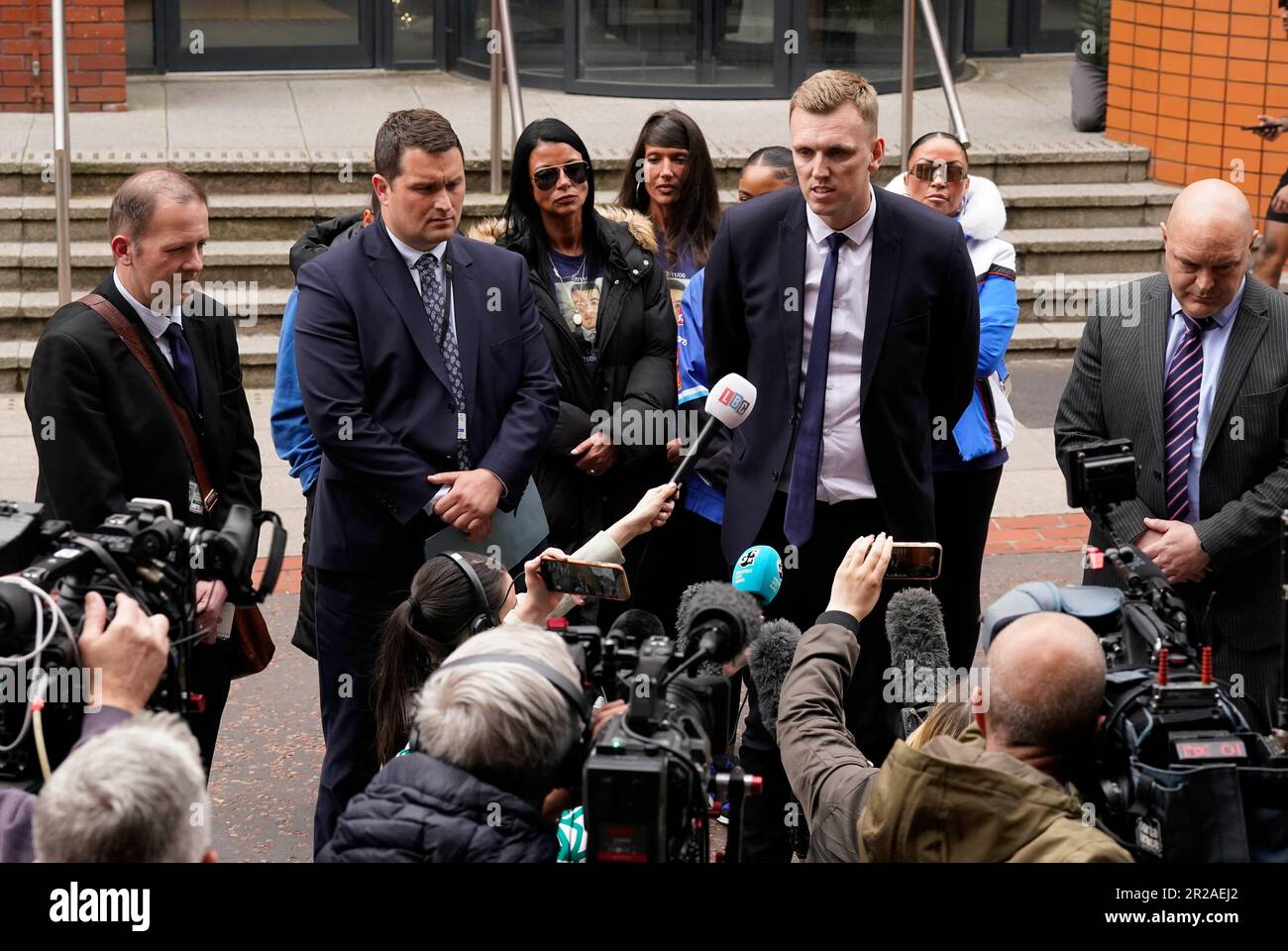 CPS Prosecutor Dan Lee (centre right) speaking to the media outside ...