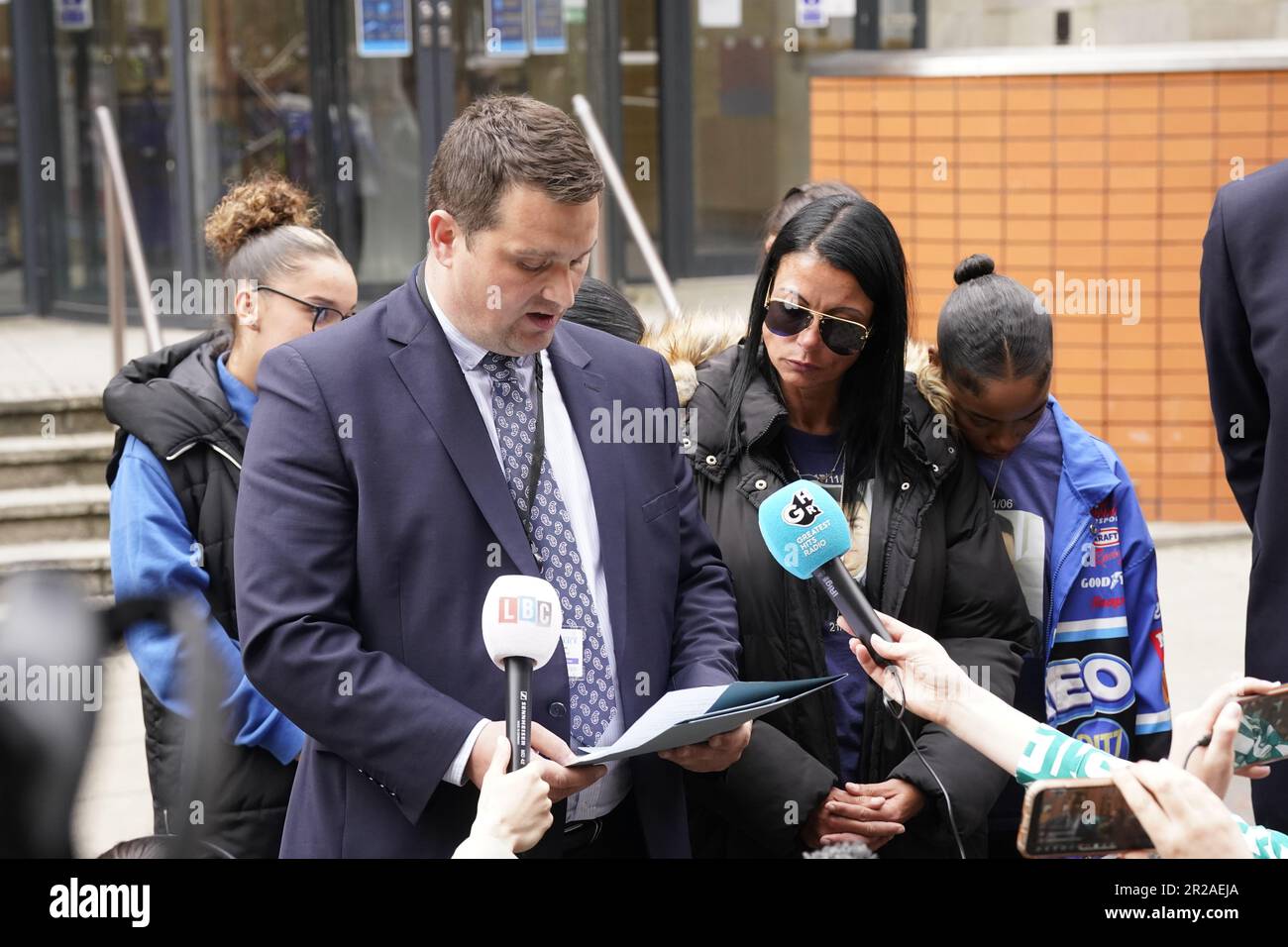 Detective Constable Lee Swift speaking to the media, with Charlie ...