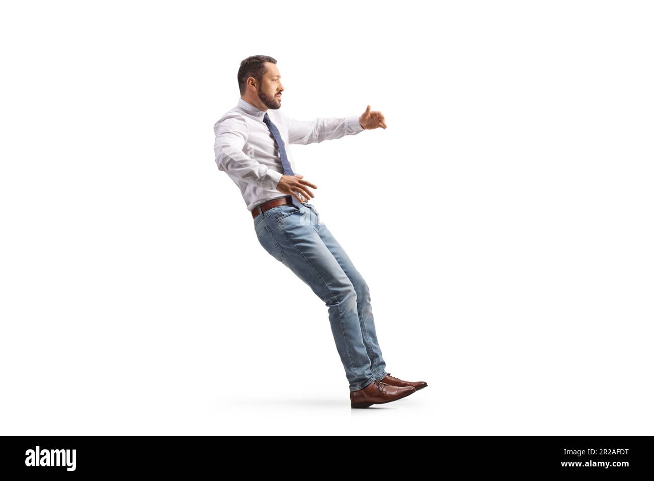Full length profile shot of a man falling isolated on white background ...