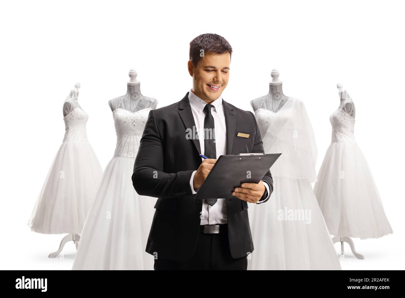 Man writing a document in a bridal shop isolated on white background ...