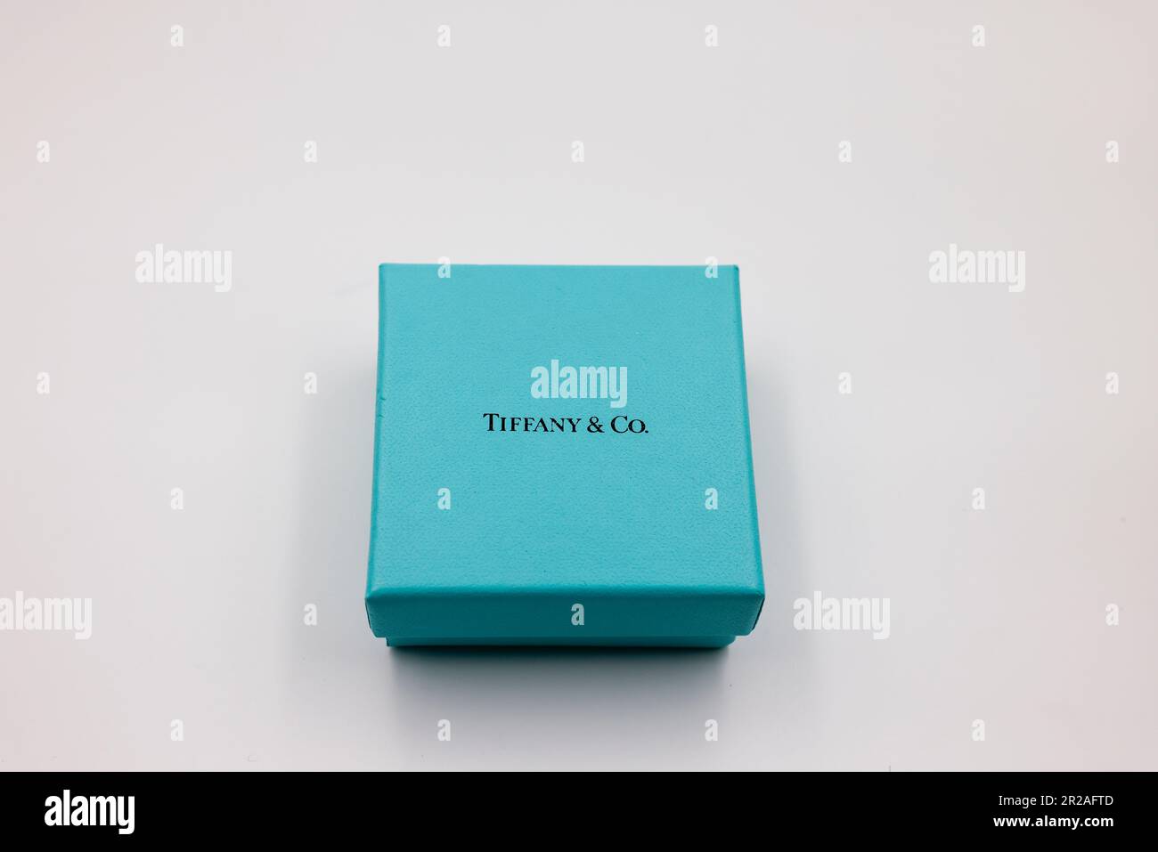 "Tiffany & Co." or Tiffany, blue jewellery box, isolated against white ...
