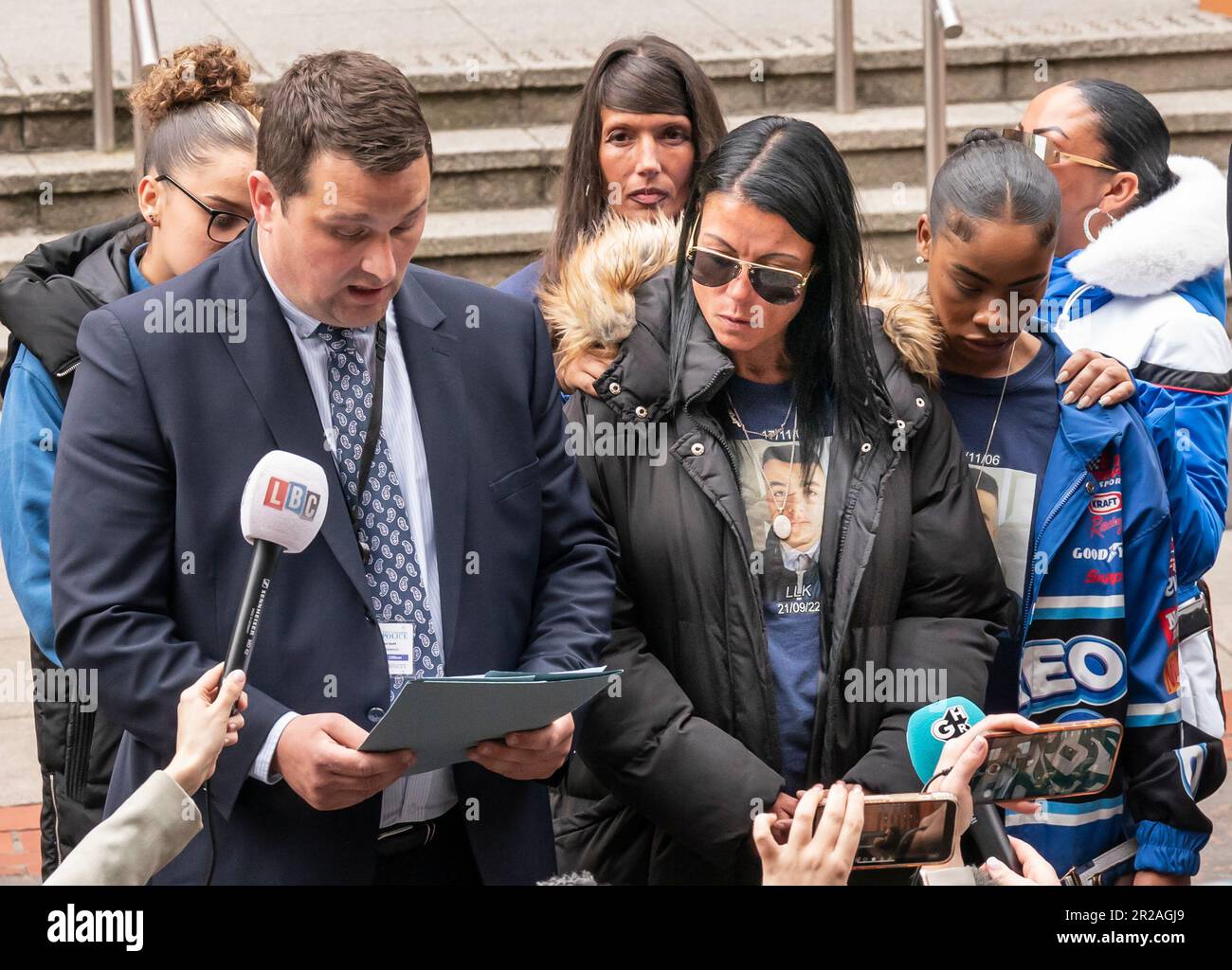 Detective Constable Lee Swift speaking to the media, with Charlie ...
