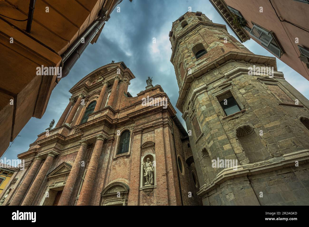 The facade and the unfinished octagonal bell tower of the Basilica of ...