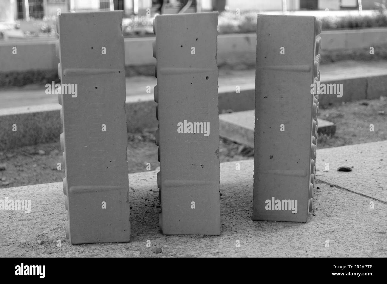 Three paving slabs during street renovation Stock Photo - Alamy