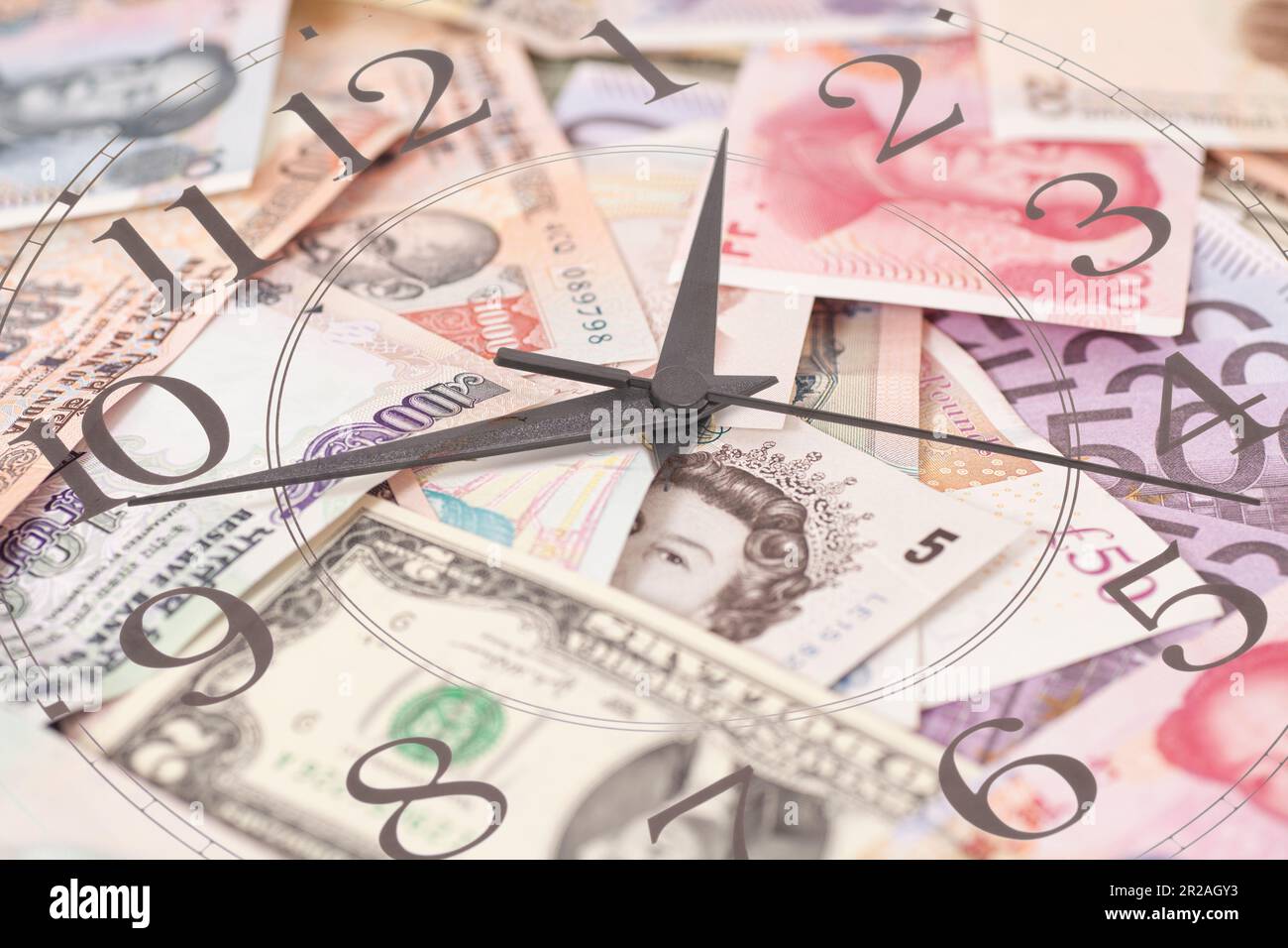 Clock face with International currencies. Time is money concept ...