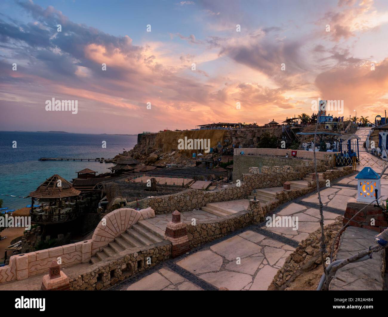 Cafes and restaurants on the cliffs at sunset in Hadaba, Sharm el ...