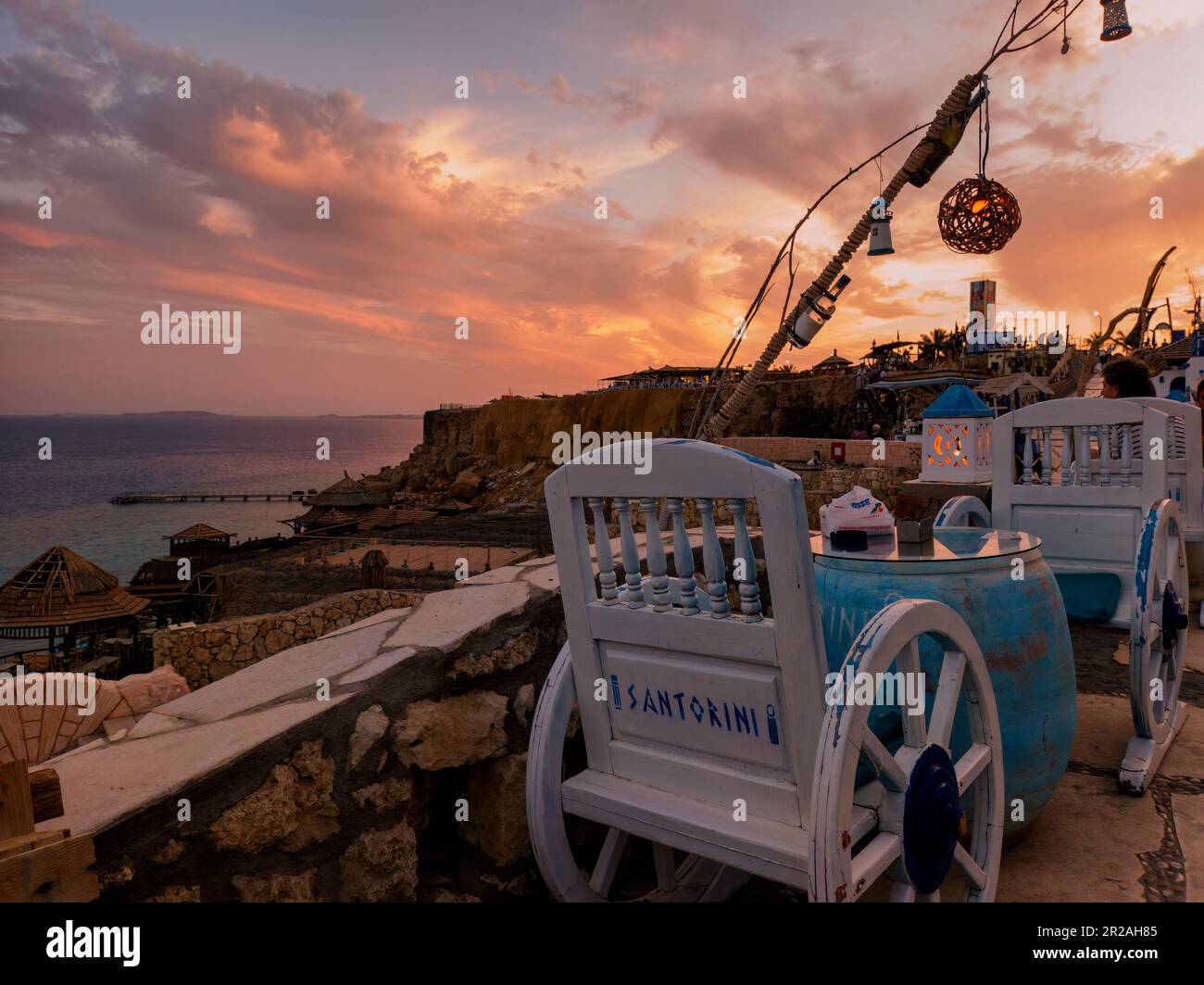 Cafes and restaurants on the cliffs at sunset in Hadaba, Sharm el ...