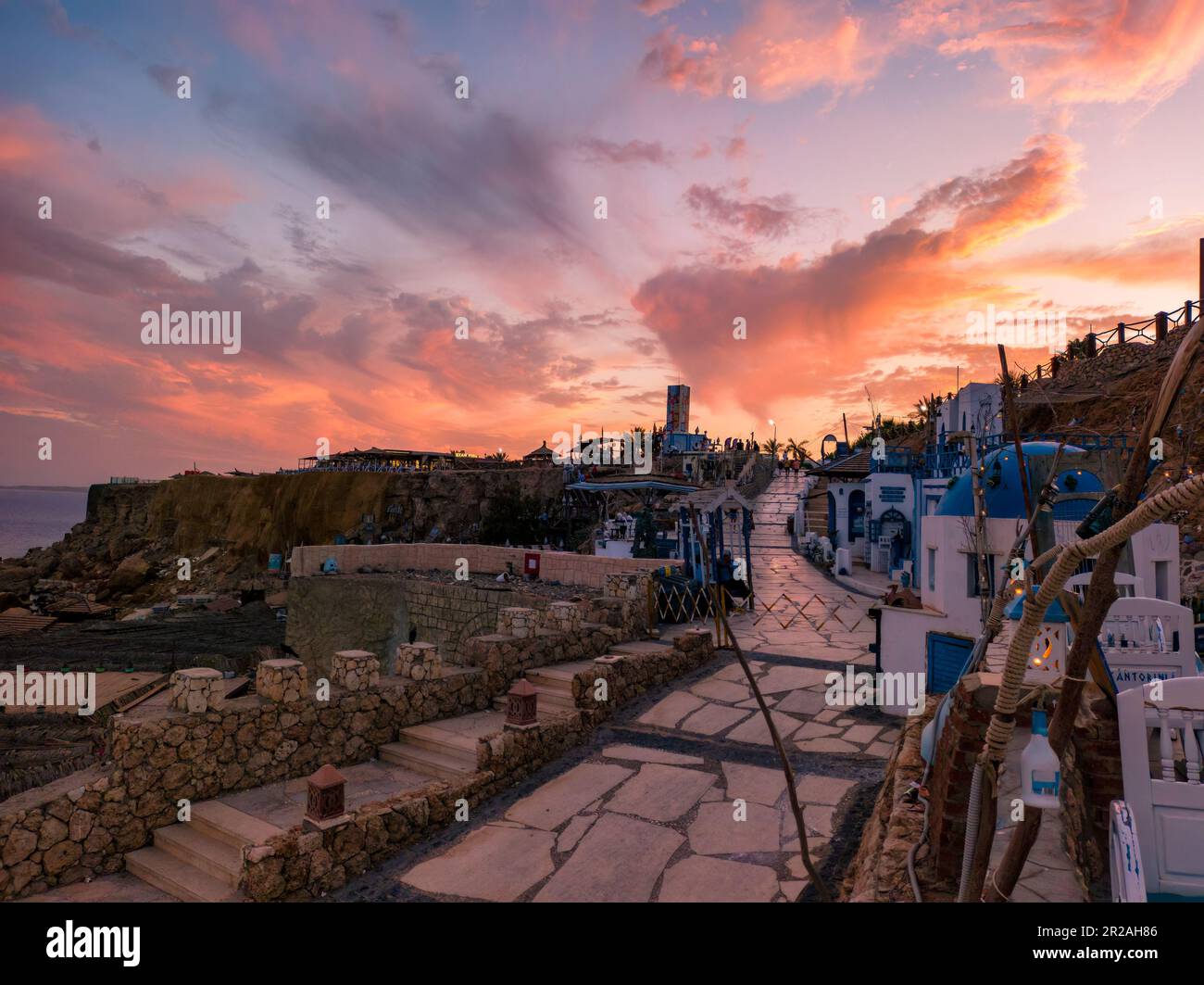 Cafes and restaurants on the cliffs at sunset in Hadaba, Sharm el ...