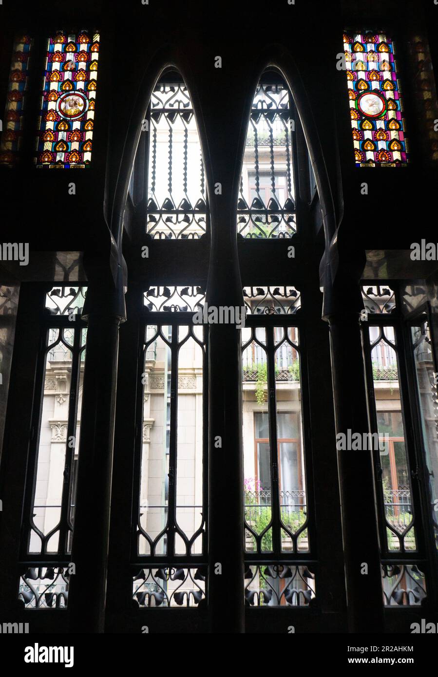 Windows facing the front street in Guell Palace, designed by Gaudi. The ...