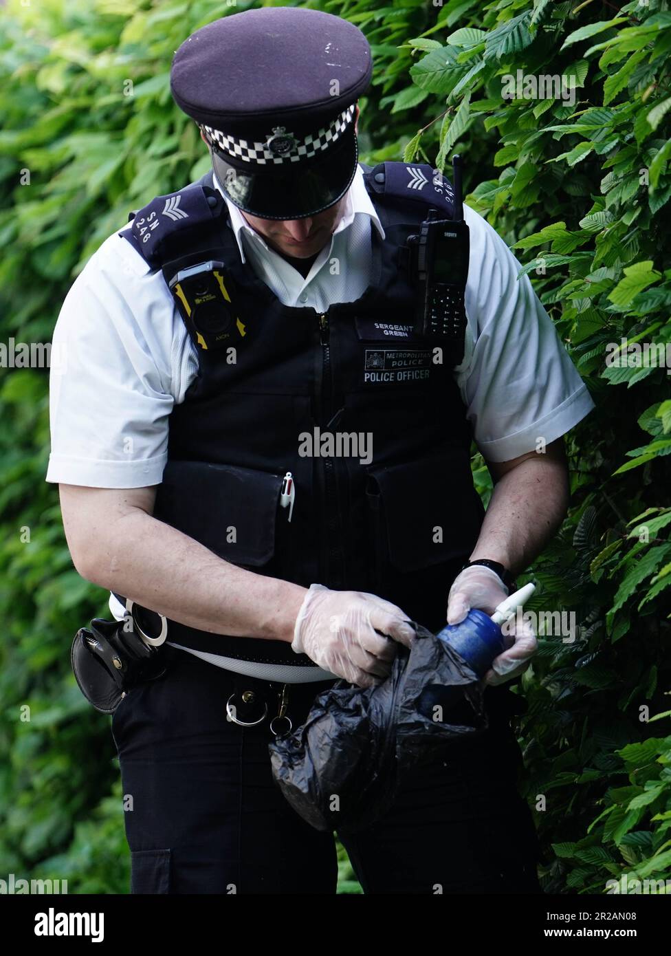 A police officer recovers a canister of possible nitrous oxide during a ...