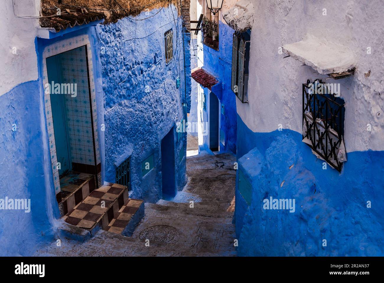 Narrow streets to access the houses of Chefchaouen a city in northwest ...