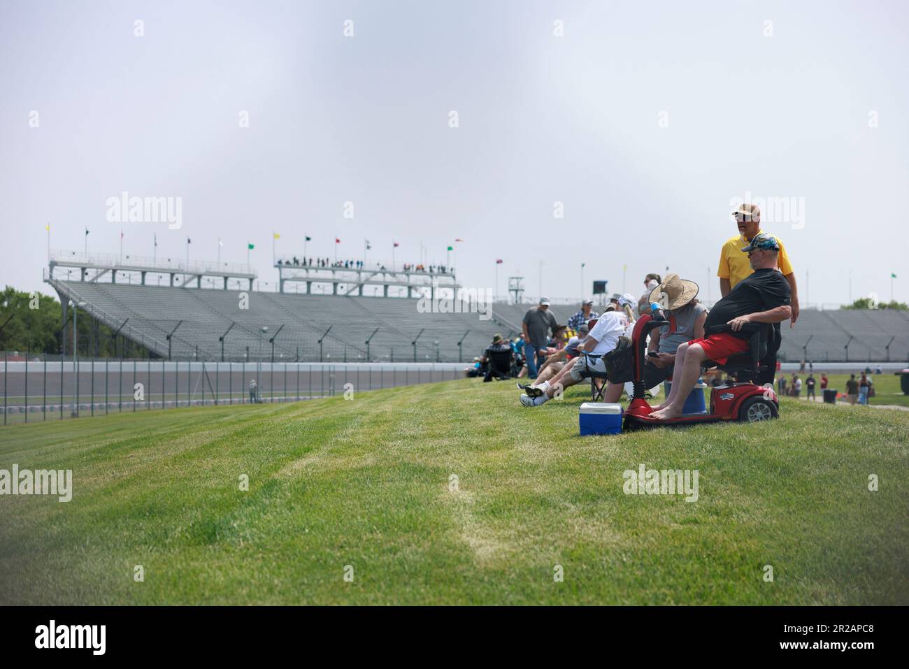 INDIANAPOLIS, INDIANA - MAY 17: Fans watch IndyCar drivers drive ...