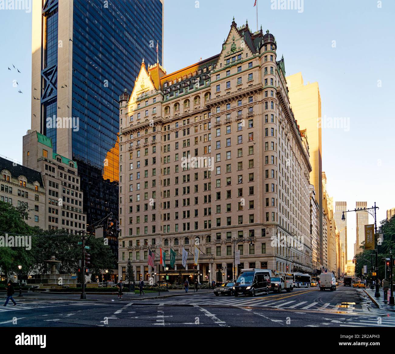 NYC landmark Plaza Hotel, as the sun just lights the hotel’s eastern ...