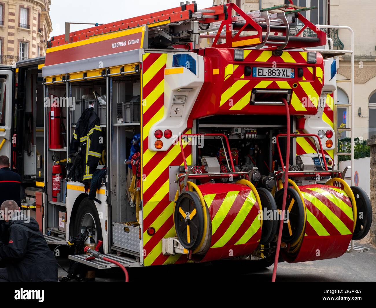 Houlgate, France May 2023. A fire truck demonstrating firefighting ...