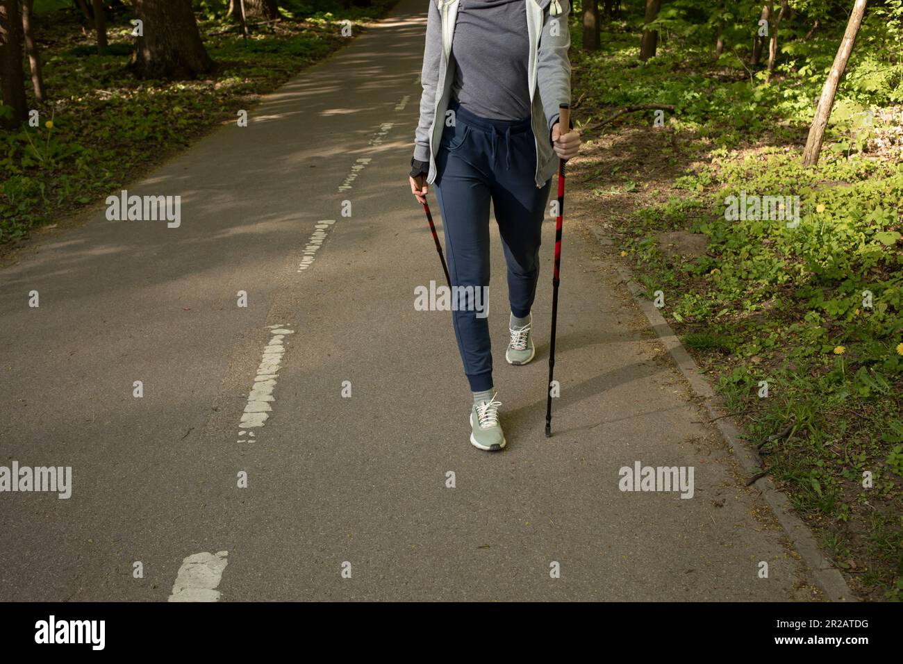 Caucasian woman running along path hi-res stock photography and images ...