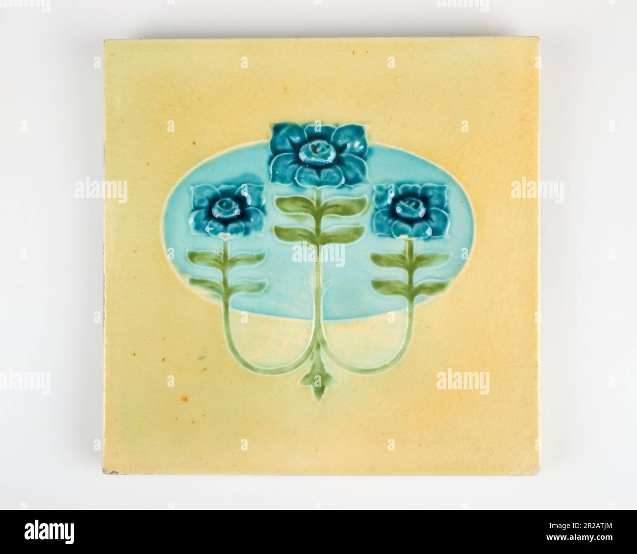 Antique 1900s Minton Art Nouveau blue flower pottery tile Stock Photo ...
