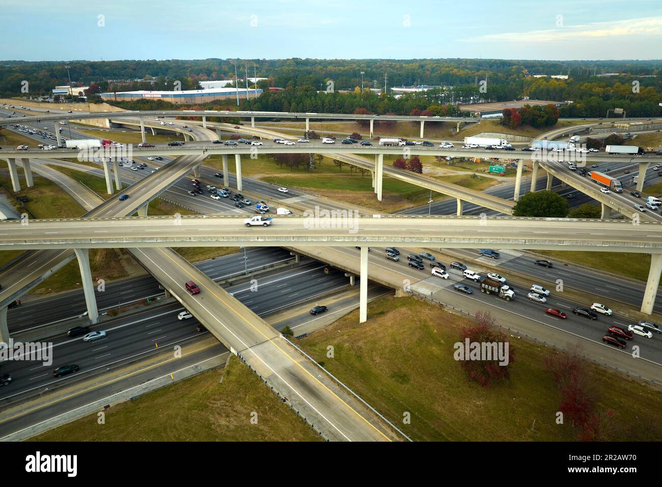 Aerial view of american freeway intersection with fast moving cars and ...
