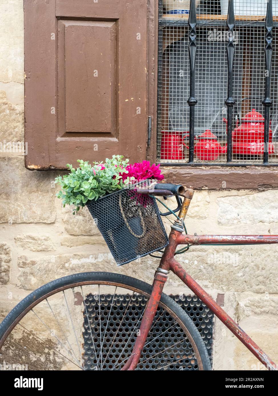 Old bicycle in the street next to a window Stock Photo - Alamy