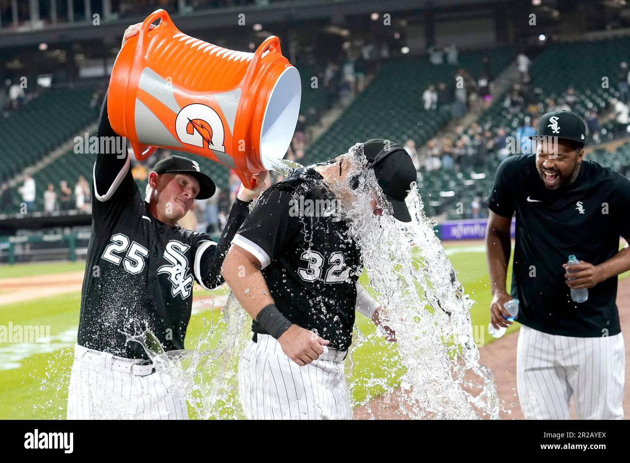 Chicago White Sox's Andrew Vaughn (25) dunks Gavin Sheets with water as ...