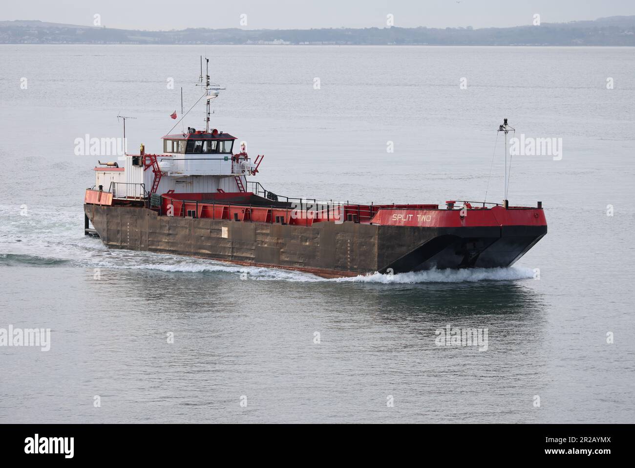 The self-propelled hopper barge MV SPLIT TWO approaching the harbour ...