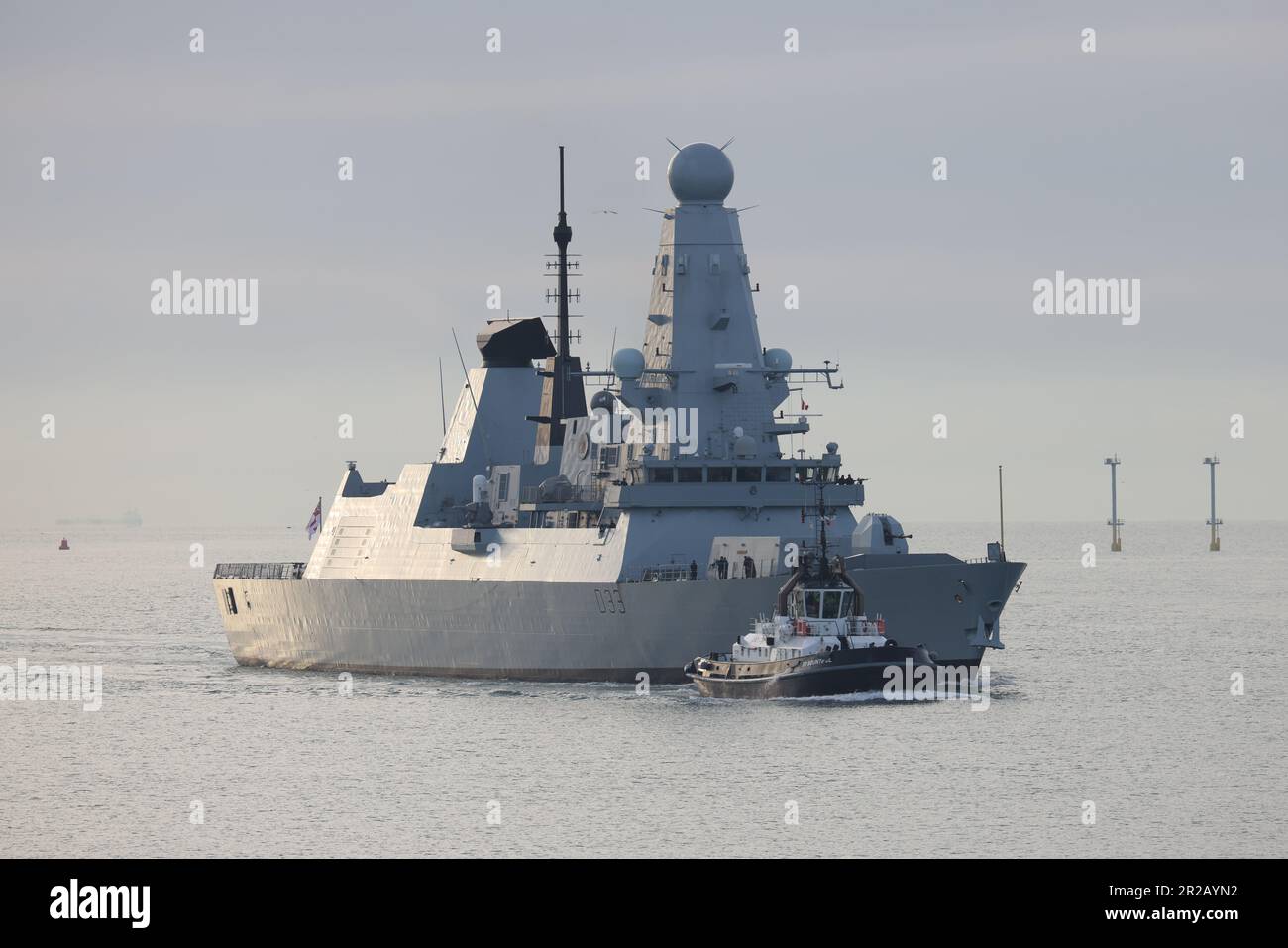 The tug BOUNTIFUL escorts the Royal Navy Type 45 destroyer HMS ...