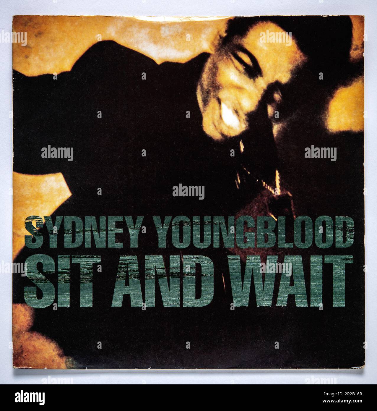 Picture cover of the seven inch single version of Sit and Wait by Sydney Youngblood, which was ...