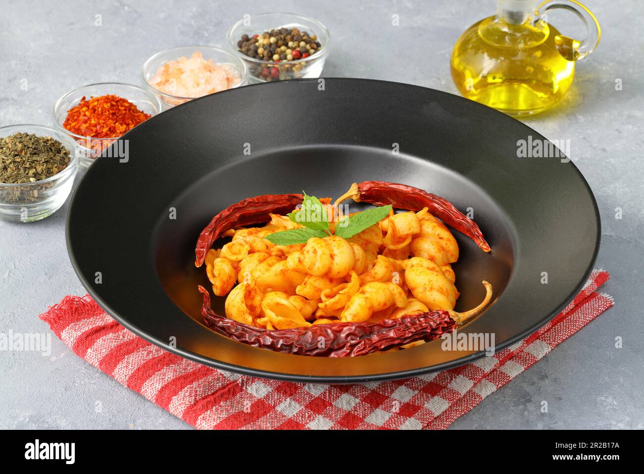 Gnocchetti sardi pasta in tomato sauce. gray background. Italian food ...