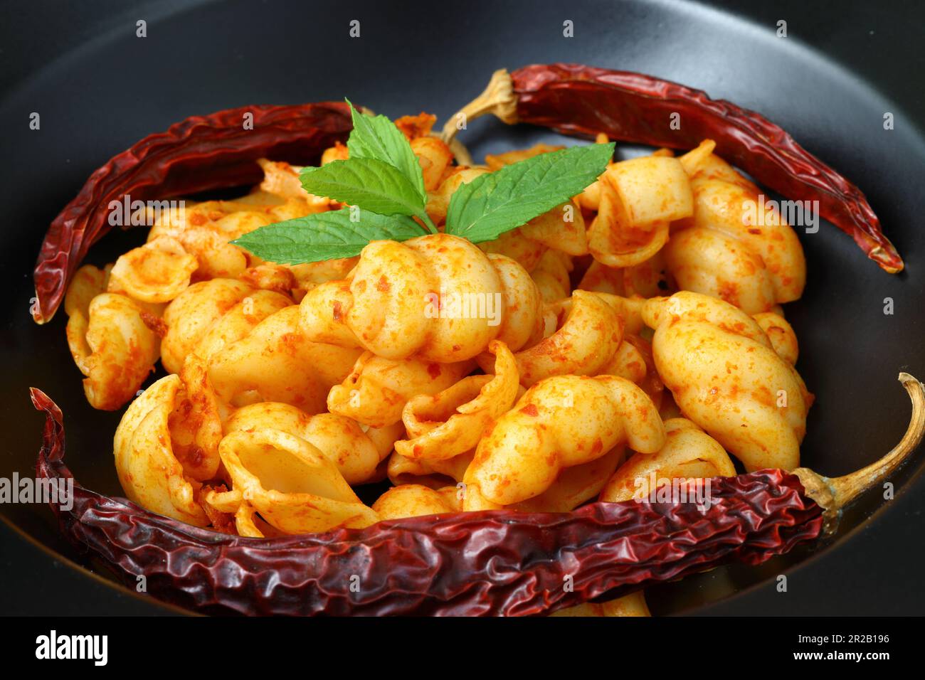 Gnocchetti sardi pasta in tomato sauce. gray background. Italian food ...