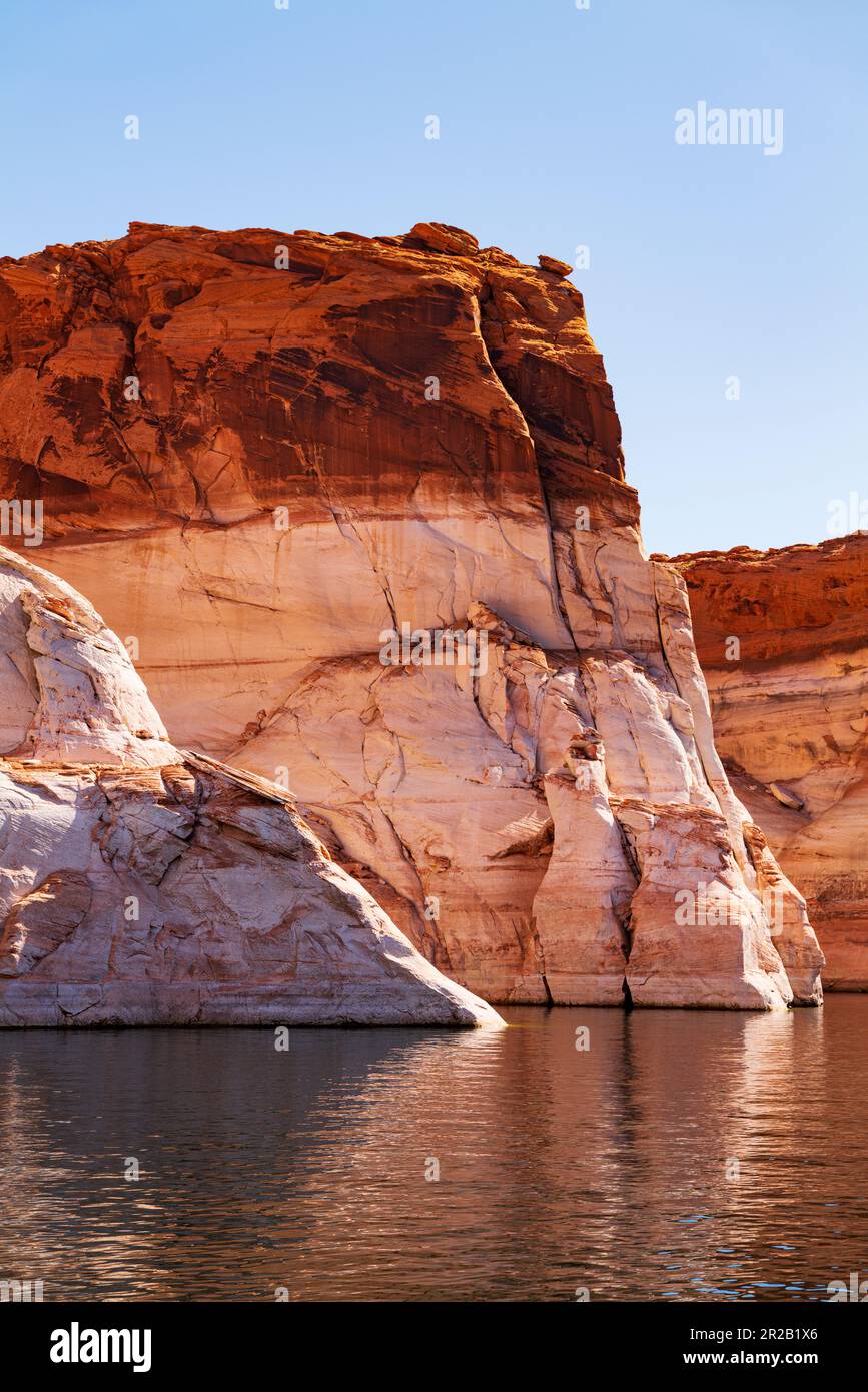 Beautiful sandstone rock formations rise from Lake Powell; Glen Canyon ...