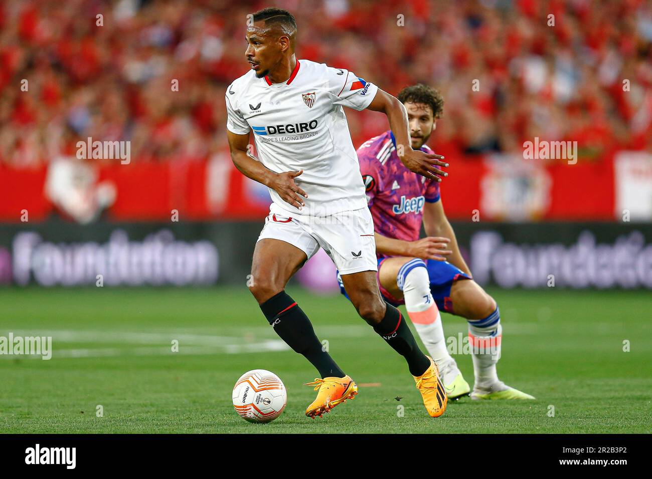 Sevilla, Spain. 18th May, 2023. Fernando Reges of Sevilla FC and Manuel ...