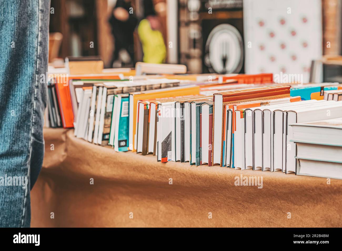 Stacks of books lying on table, flea market, street trading, real ...