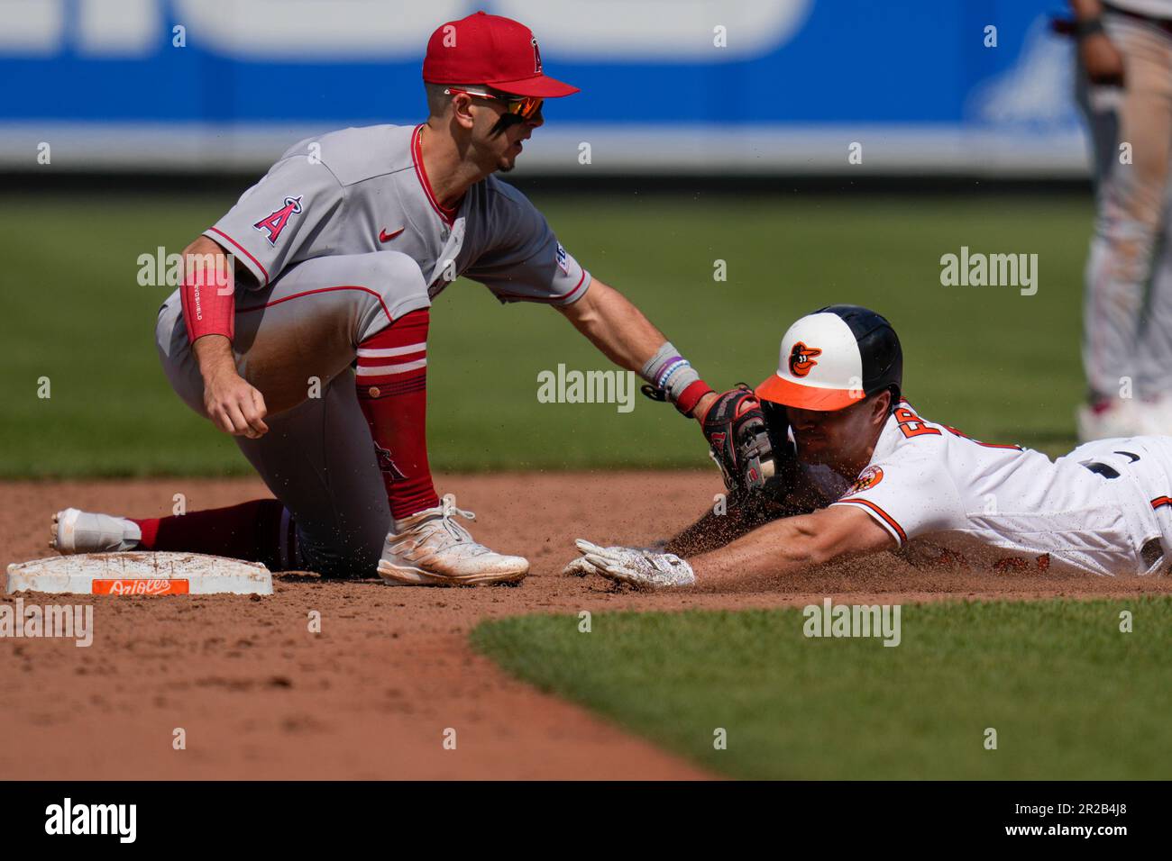 Los Angeles Angels shortstop Zach Neto, left, tags out Baltimore ...