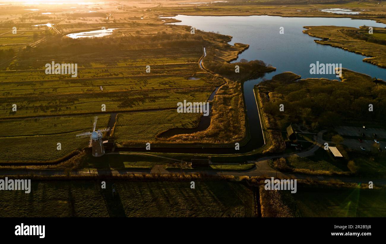 Aerial view of Horsey Drainage Mill over looking Horsey Mere and ...