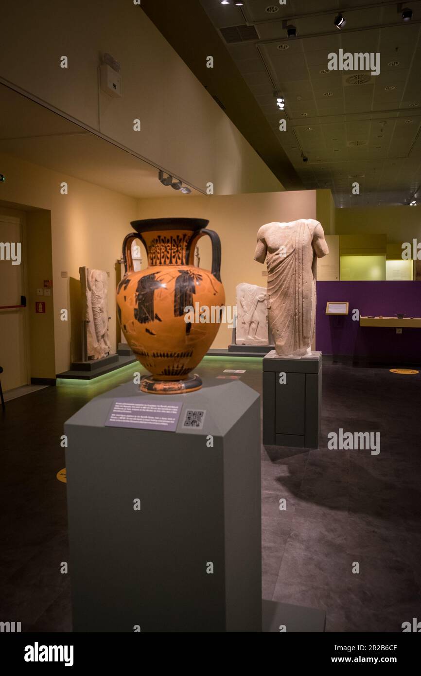 Attic black amphora depicting the God Apollo with a lyre between two ...