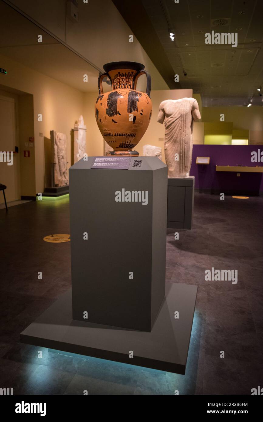 Attic black amphora depicting the God Apollo with a lyre between two ...