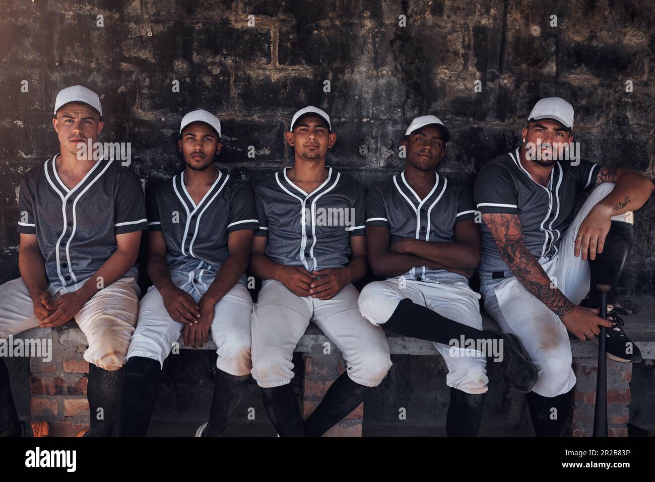 Give us a game of baseball any day. Portrait of a group of young men ...