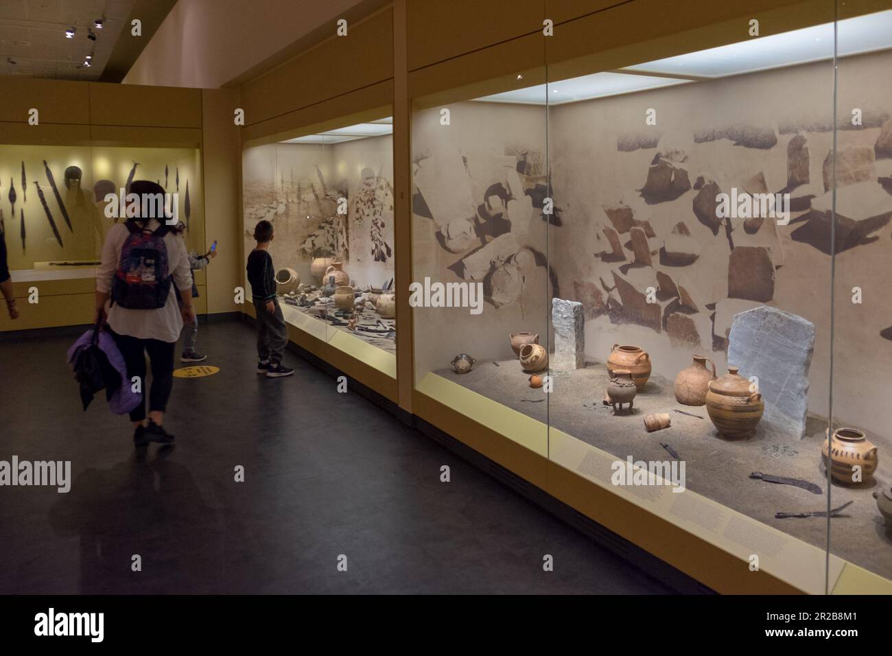 People and walking and staring the exhibits from the classical ...