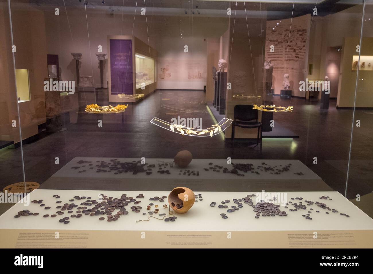 Golden wreaths with olive leaves 9hellenistic period) and silver coins ...